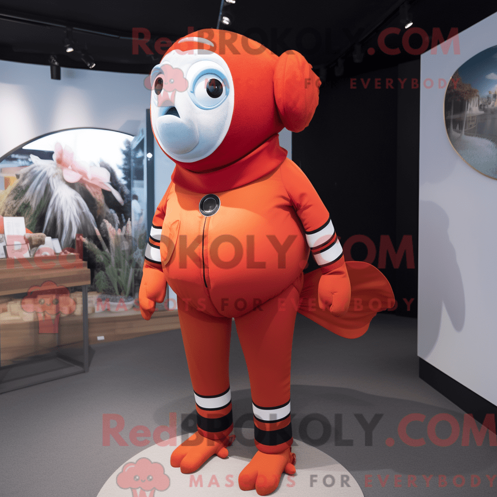 REDBROKOLY mascot character of a Red Clown Fish dressed with a Capri ...