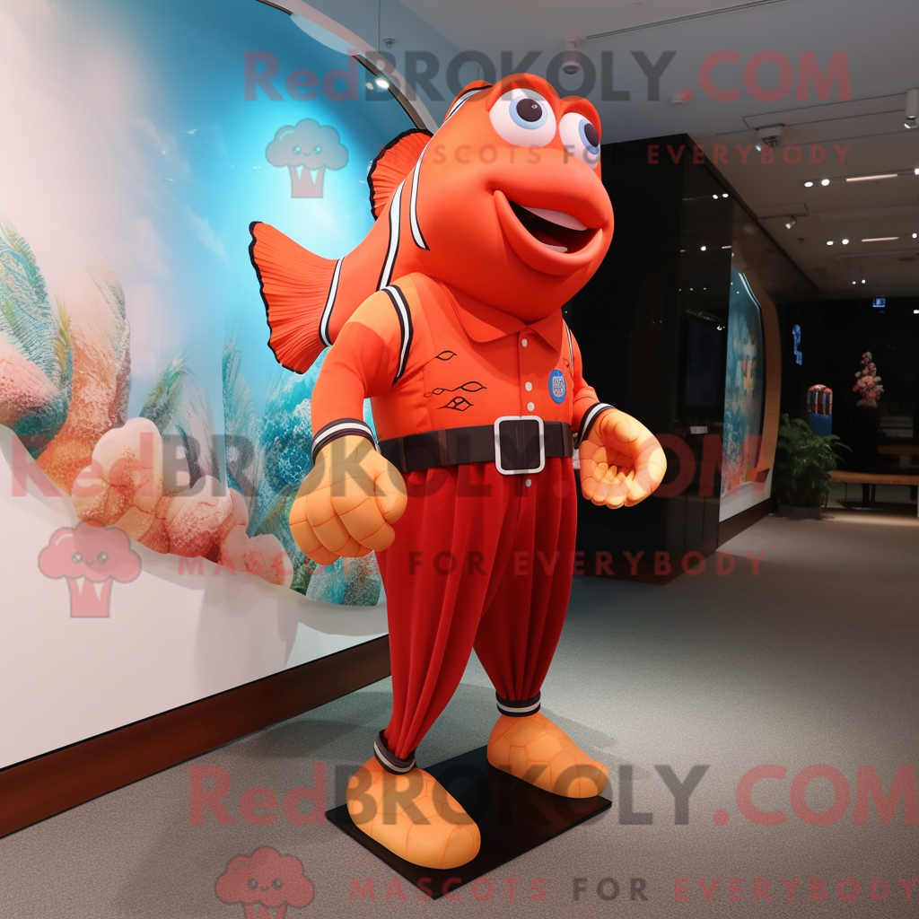 REDBROKOLY mascot character of a Red Clown Fish dressed with a Capri ...