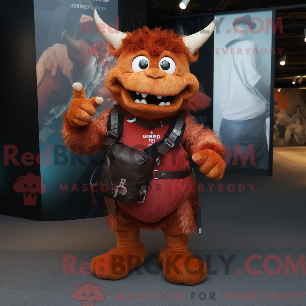 REDBROKOLY mascot character of a Rust Devil dressed with a Vest and ...