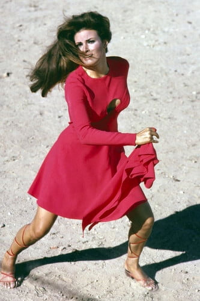 Raquel Welch in Fathom running in classic red dress with cleavage hole ...