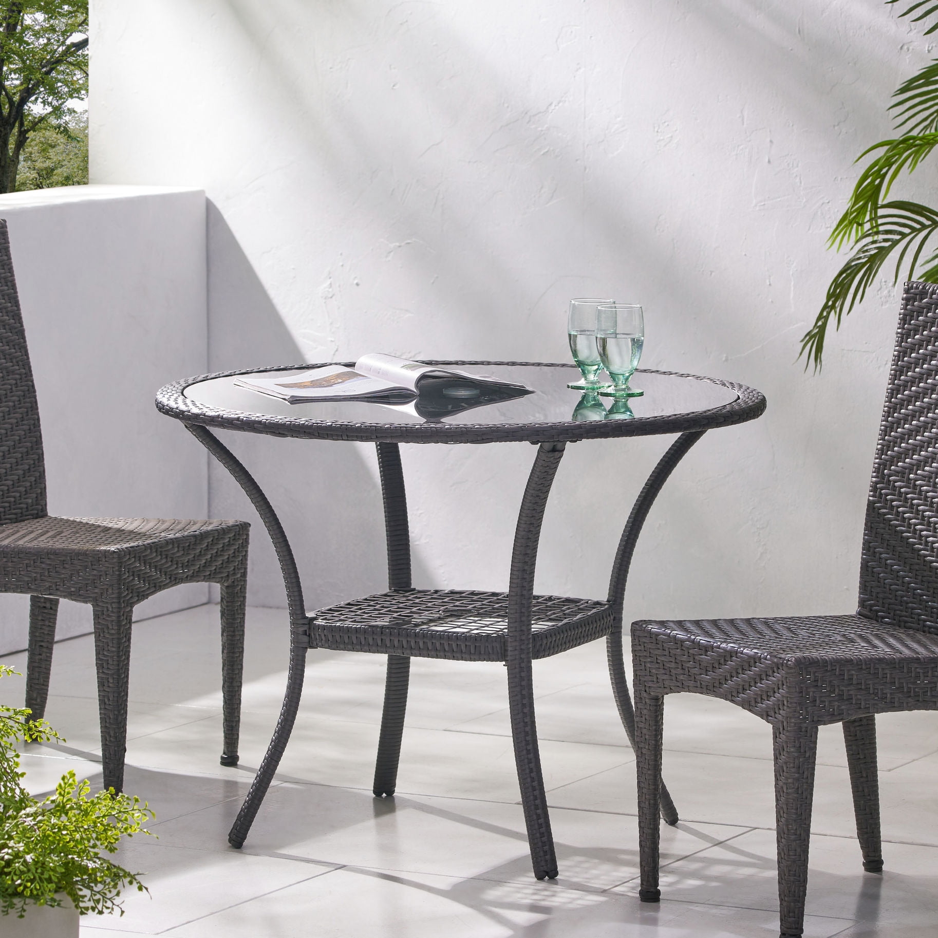 Rattan - wrapped iron legs + stable base” - “Indoor/outdoor placement ...