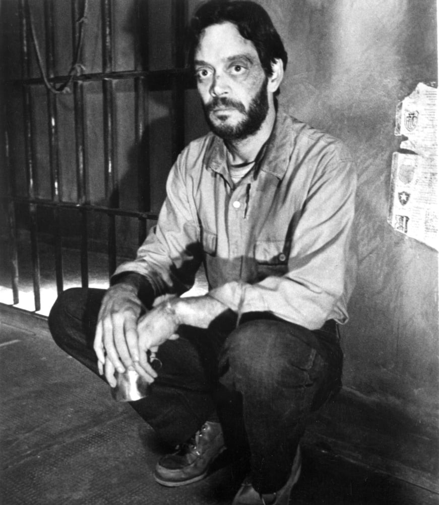 Raul Julia crouching in a prison Photo Print (8 x 10) - Walmart.com