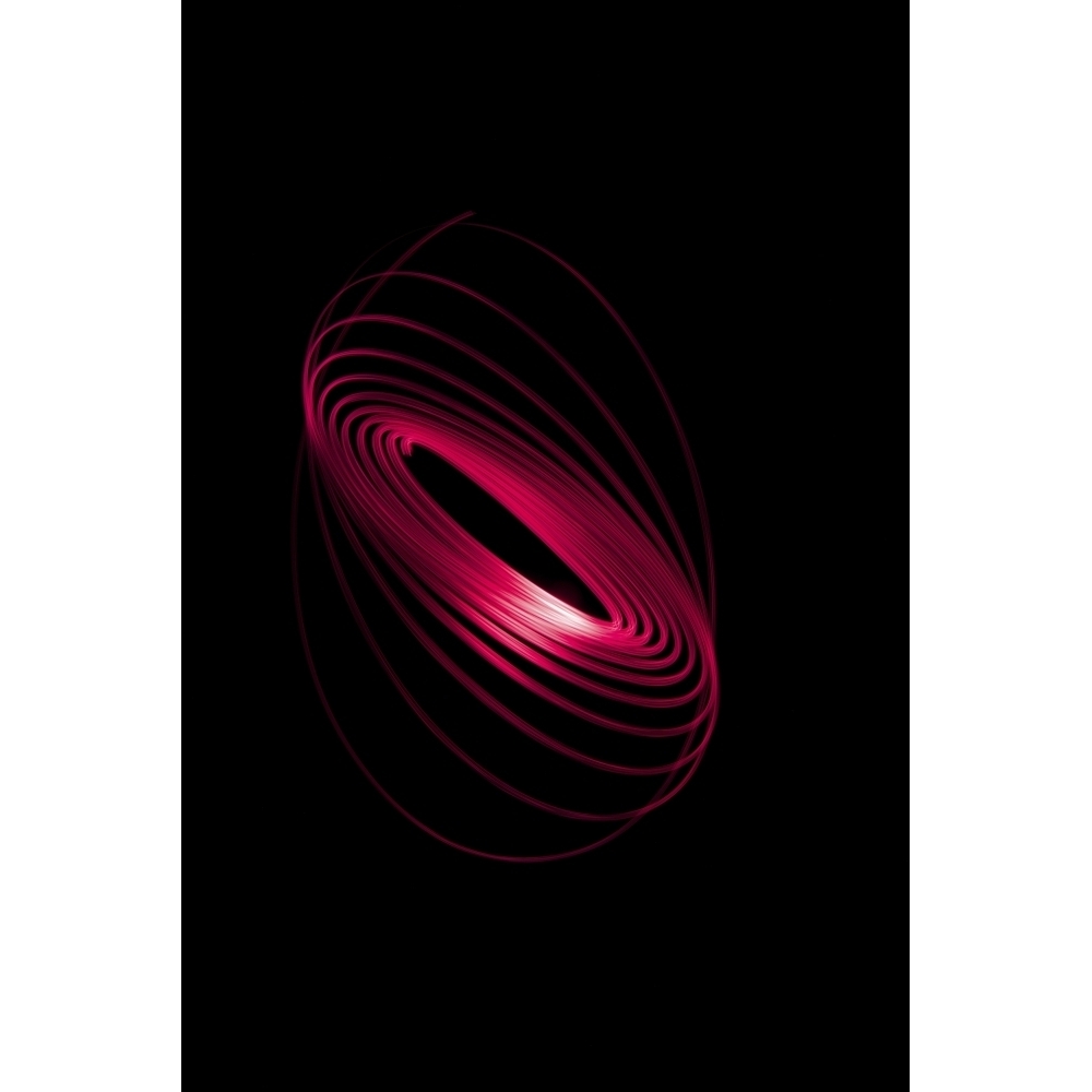 Red light curving in a sphere shape on a black background Poster Print ...