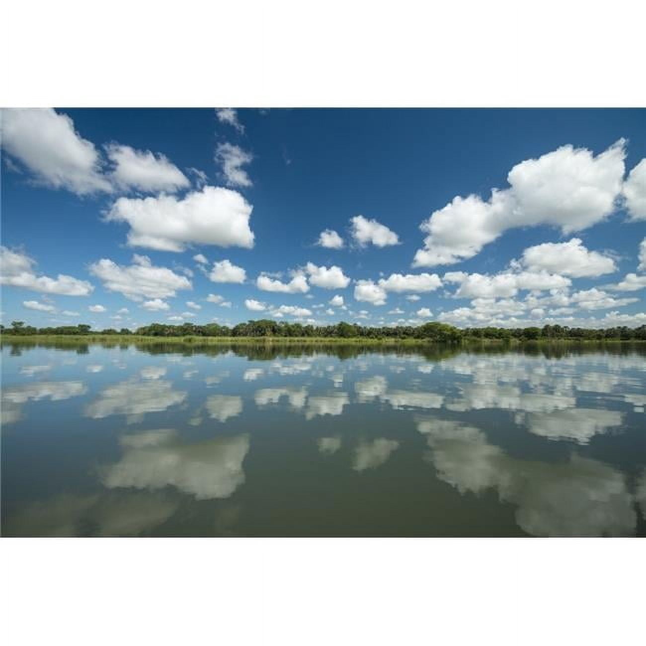 Reflections across the calm waters of the Shire River Liwonde National ...