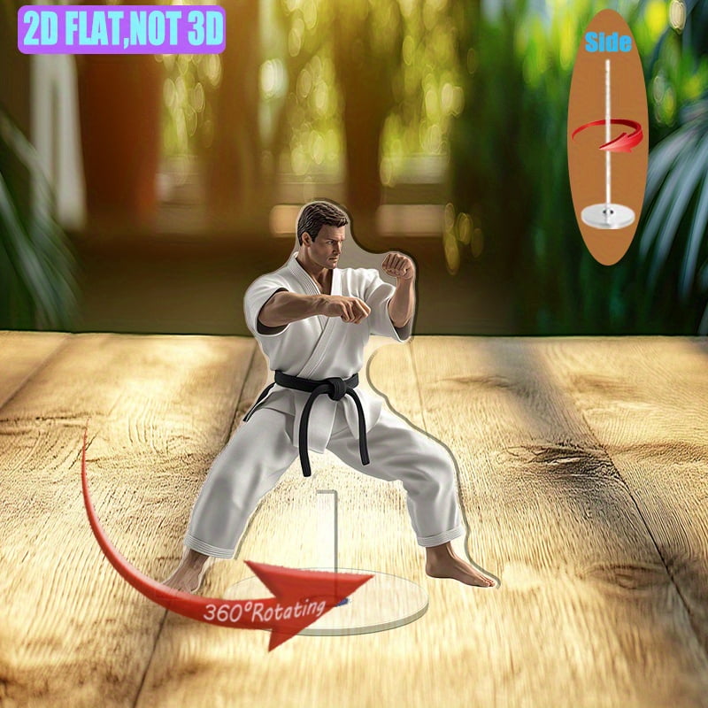 Revolving acrylic display features an ultra-realistic karate competitor ...