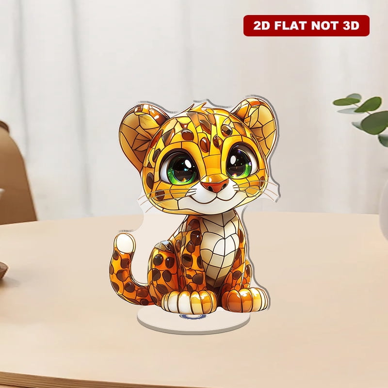 Revolving acrylic ornament featuring a cute cheetah with emerald eyes a ...