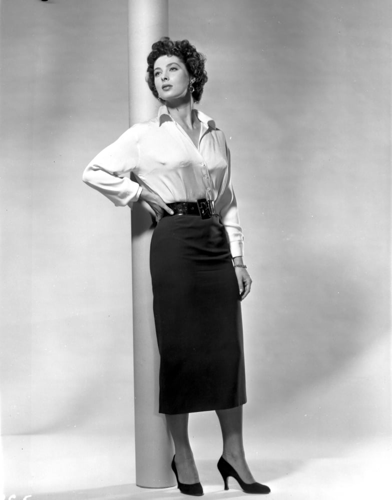 Rita Gam Leaning on Post with Hand on Hip Photo Print (8 x 10 ...