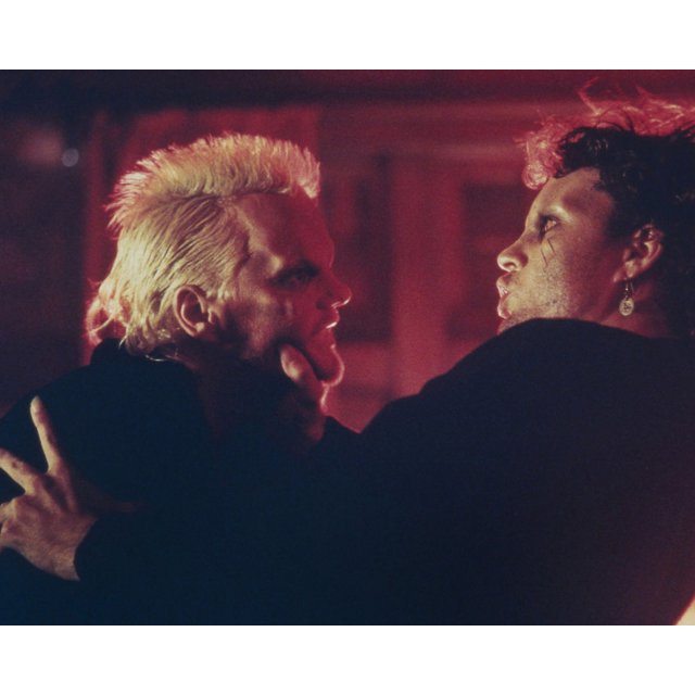 Robert Prosky in Gremlins 2: The New Batch seated in chair with ...