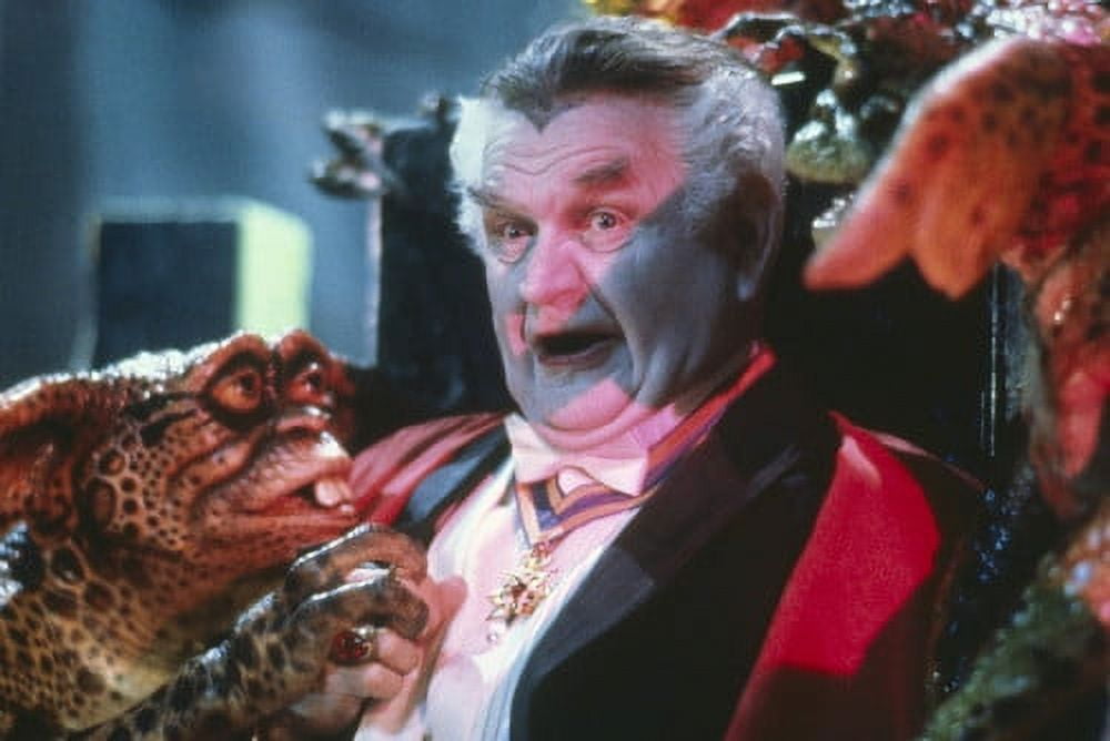 Robert Prosky in Gremlins 2: The New Batch seated in chair with ...