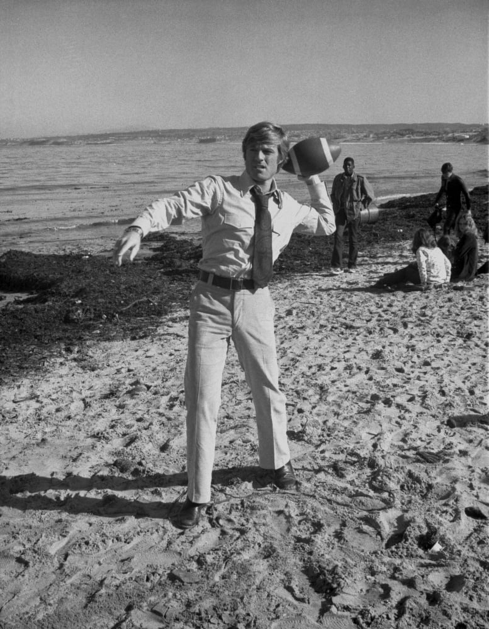 Robert Redford Playing Football at the Beach Photo Print (24 x 30 ...