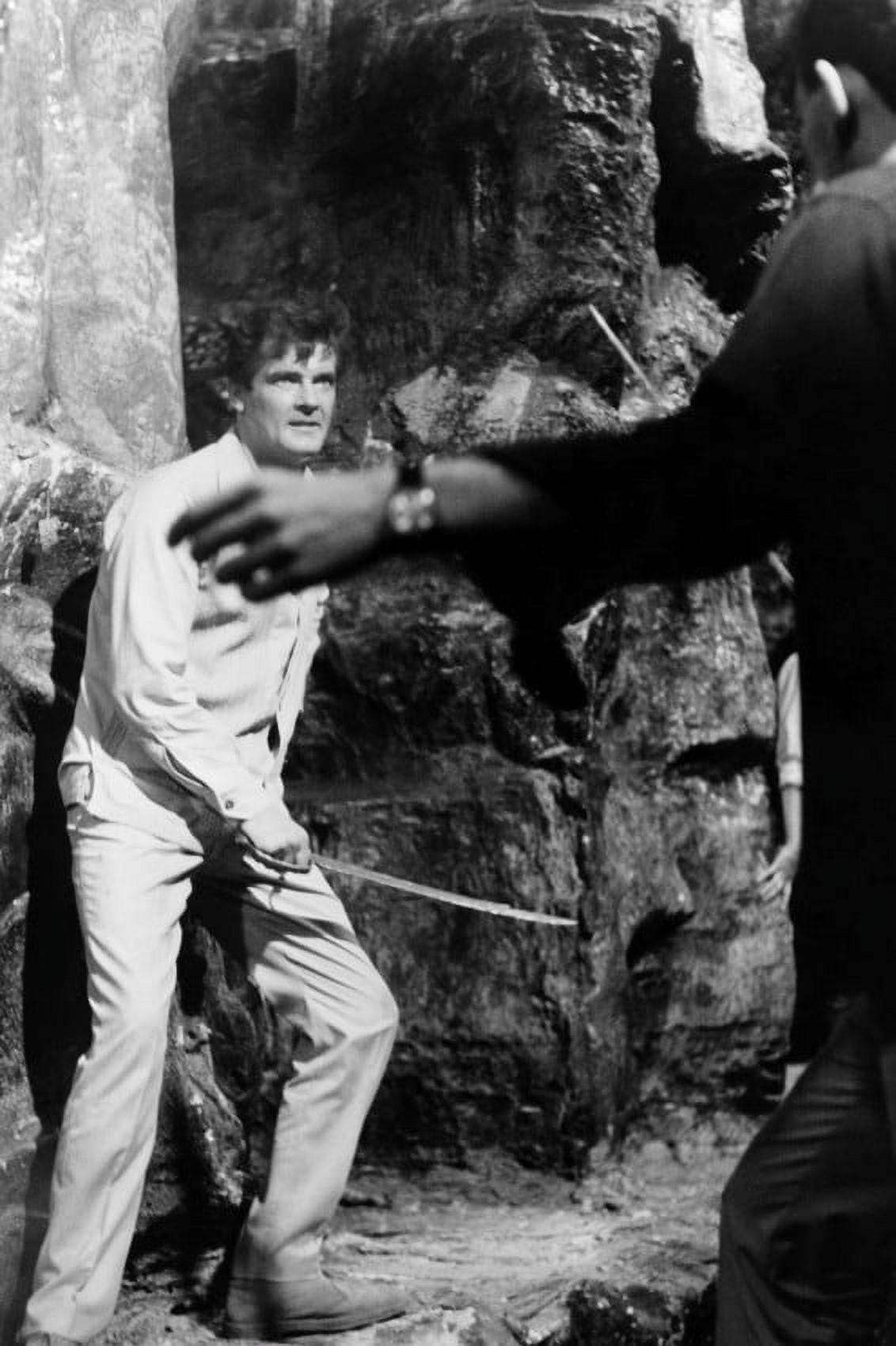 Roger Moore in The Saint holding sword about to fight villain 24x36 ...