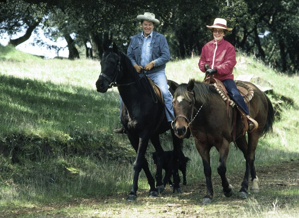 Ronald and Nancy Reagan riding horses on their ranch in Santa Barbara ...
