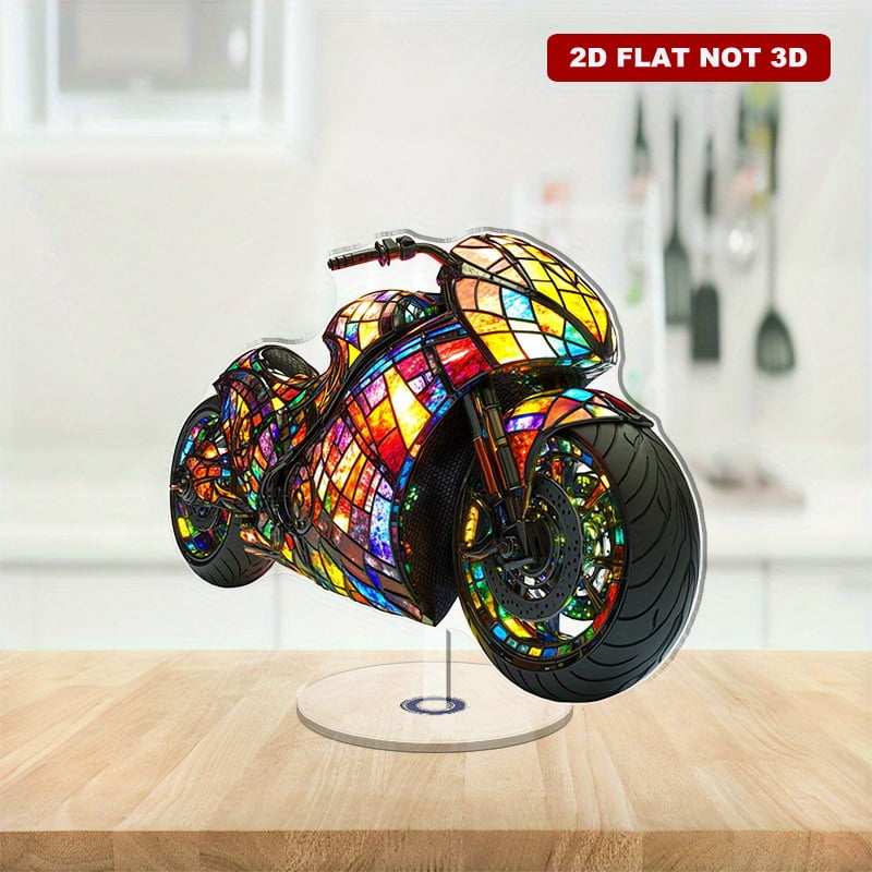 Rotatable acrylic display featuring a daring motorcycle with a heavy ...
