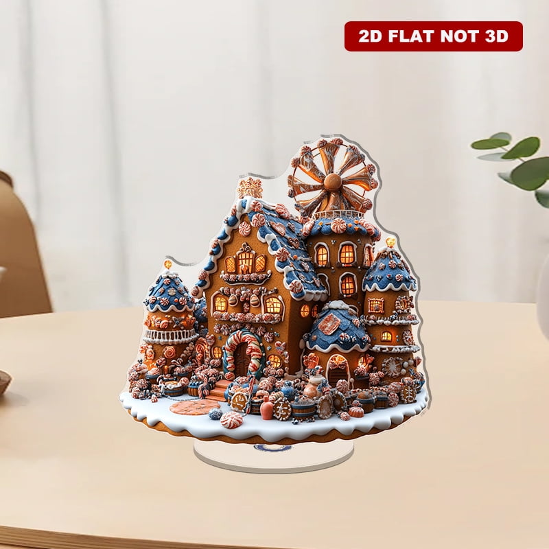 Rotatable acrylic display featuring a detailed gingerbread house with a ...
