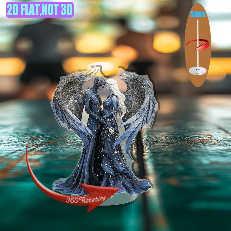 Rotatable acrylic figurine of a celestial couple with star-dusted wings ...