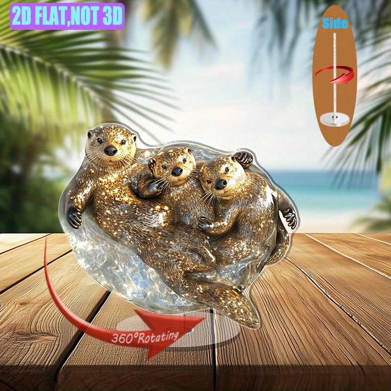 Rotating acrylic centerpiece featuring three otters holding hands in a ...