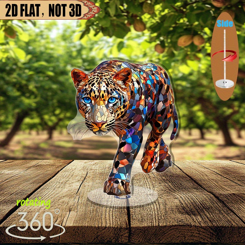 Rotating acrylic decor piece featuring a stylized leopard with vibrant ...