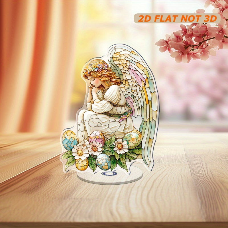 Rotating acrylic decoration featuring an angel surrounded by flowers ...