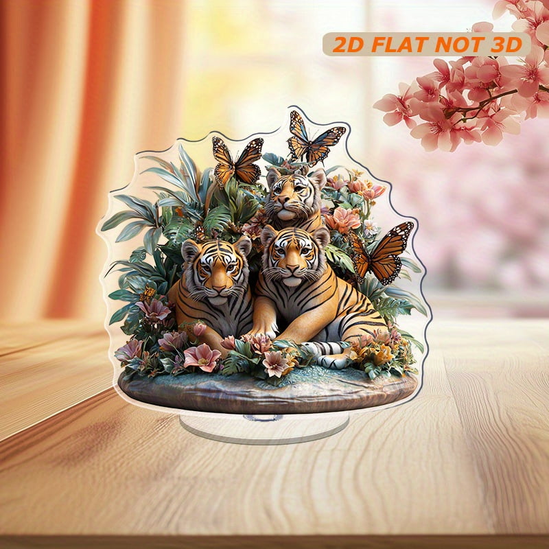Rotating acrylic decoration featuring three playful tigers amidst ...