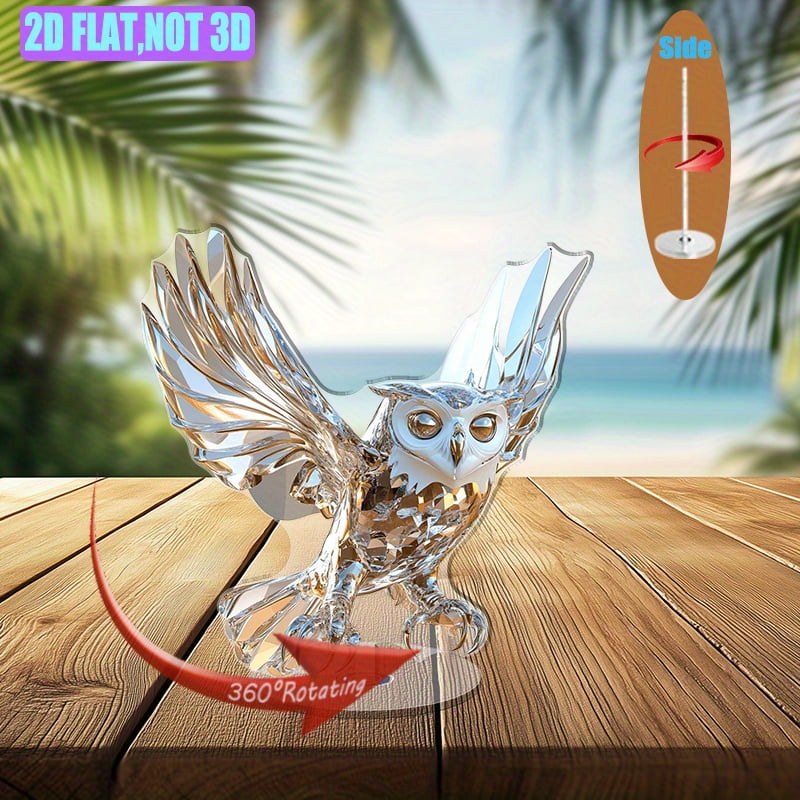 Rotating acrylic display features a crystal clear owl design with ...