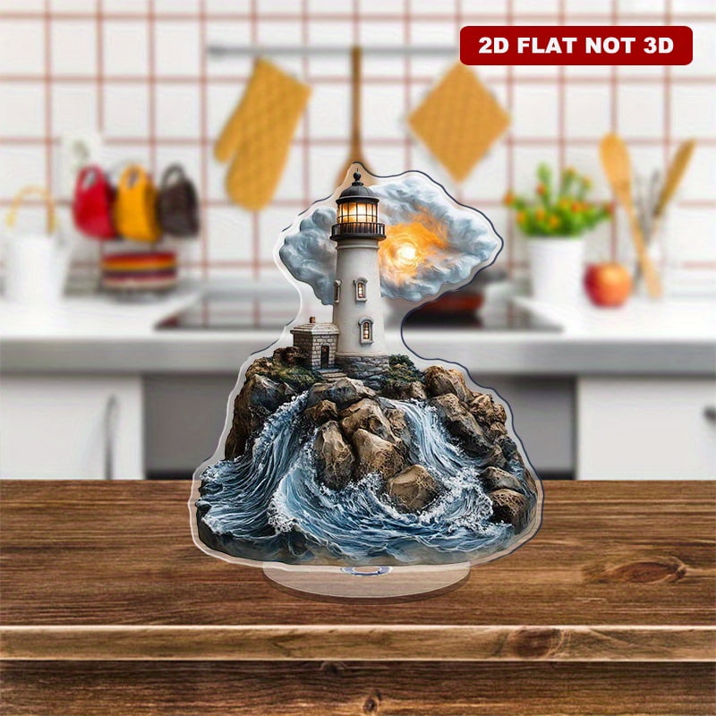 Rotating acrylic display features a detailed lighthouse sculpture on ...