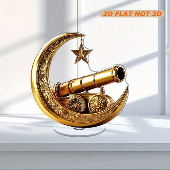 Rotating acrylic display features a golden cannon on a crescent moon ...