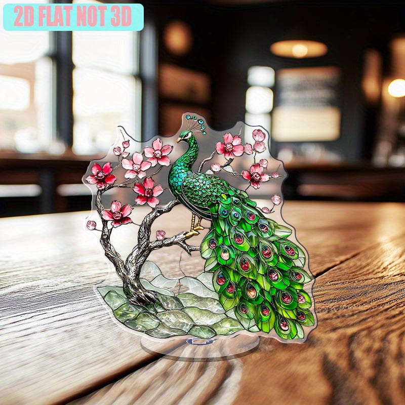 Rotating acrylic display features a lifelike green peacock and cherry ...