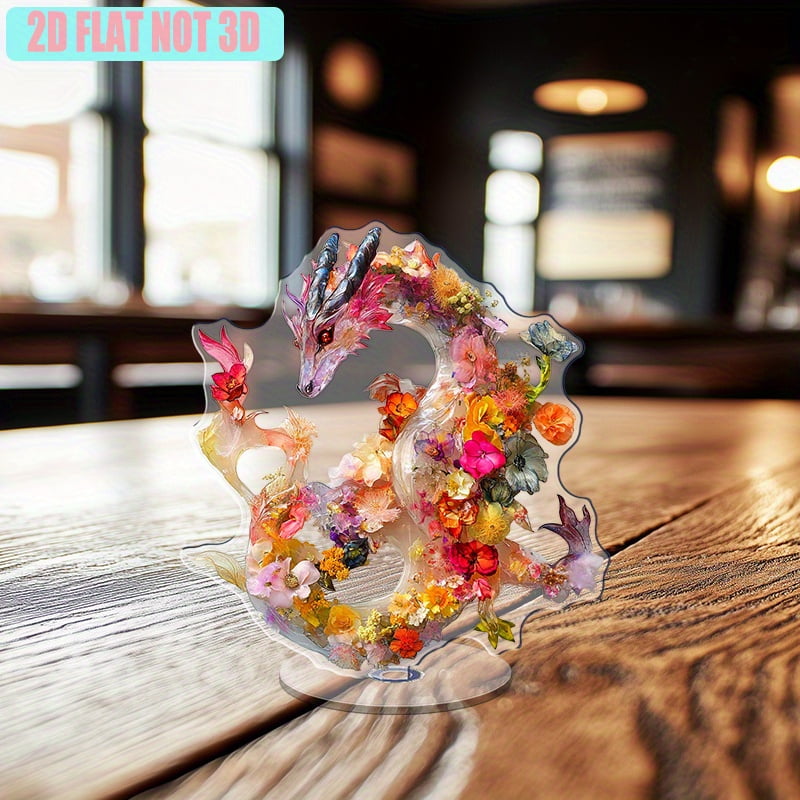 Rotating acrylic display features a resin dragon with dried flowers and ...