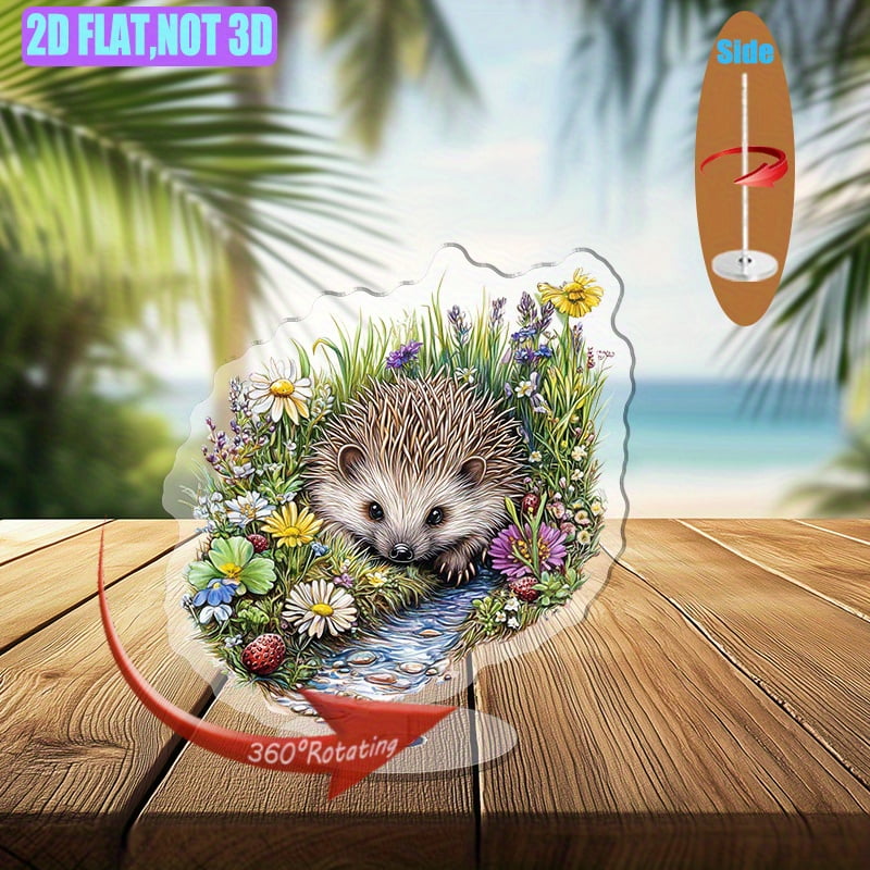 Rotating acrylic display features a sparkling hedgehog nestled in lush ...
