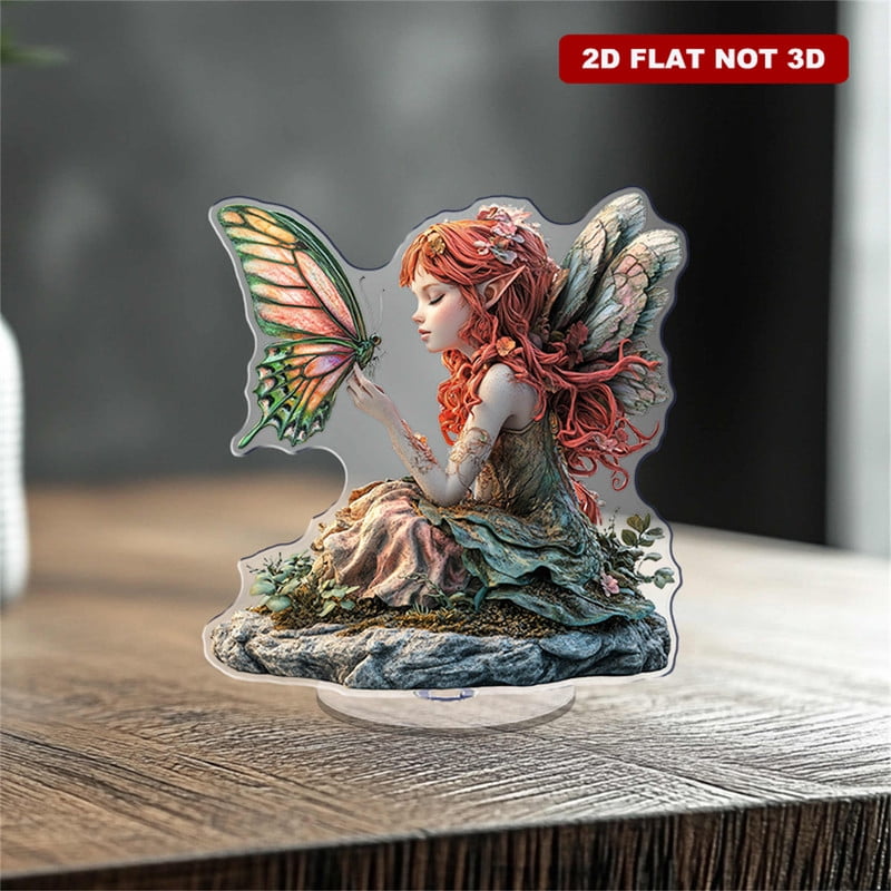 Rotating acrylic display features a vibrant red-haired fairy holding an iridescent butterfly on ...