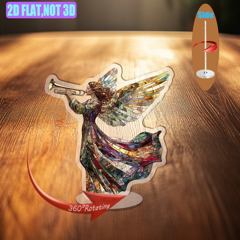 Rotating acrylic display features a vibrant stained glass angel blowing ...