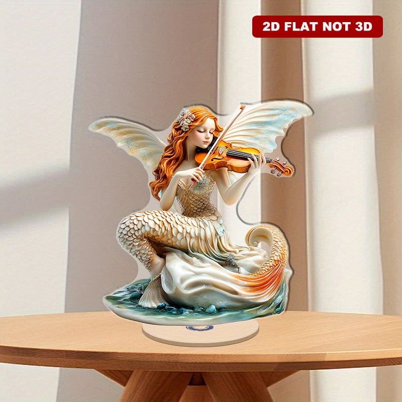 Rotating acrylic display features a water nymph angel with fish-scale ...