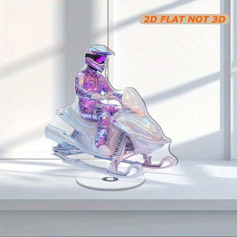Rotating acrylic display features a snowmobiler's suit with holographic ...