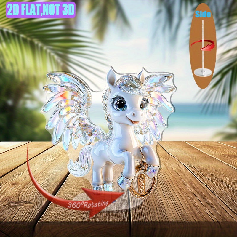 Rotating acrylic display features a sparkling Pegasus with white wings ...