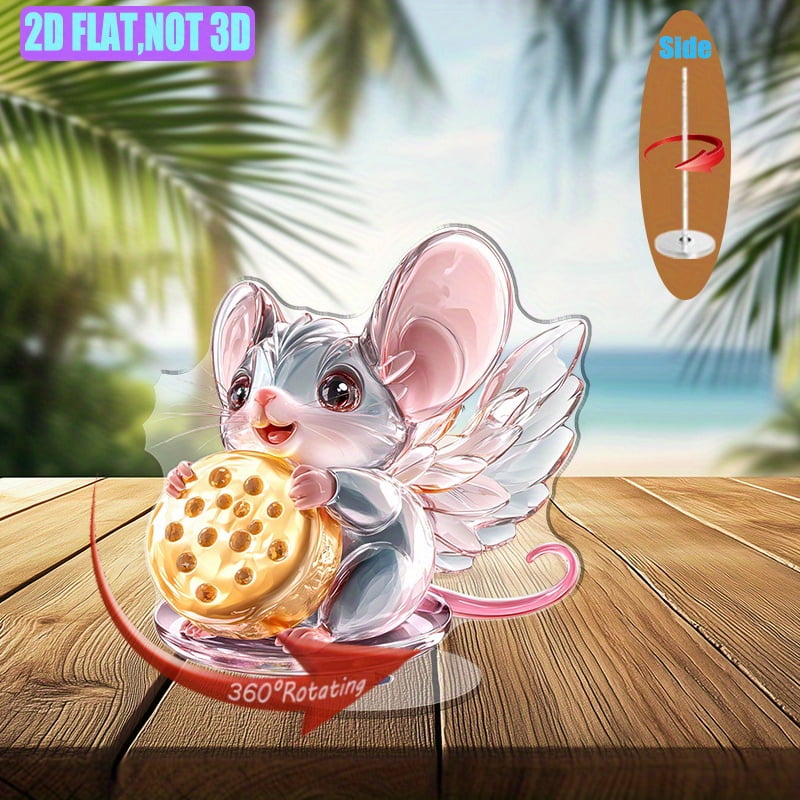 Rotating acrylic display features a sparkling winged mouse with ...