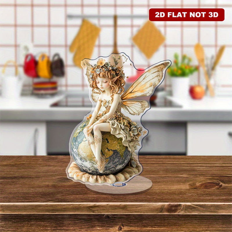 Rotating acrylic display features a whimsical fairy with pastel flowers and glowing wings on a ...