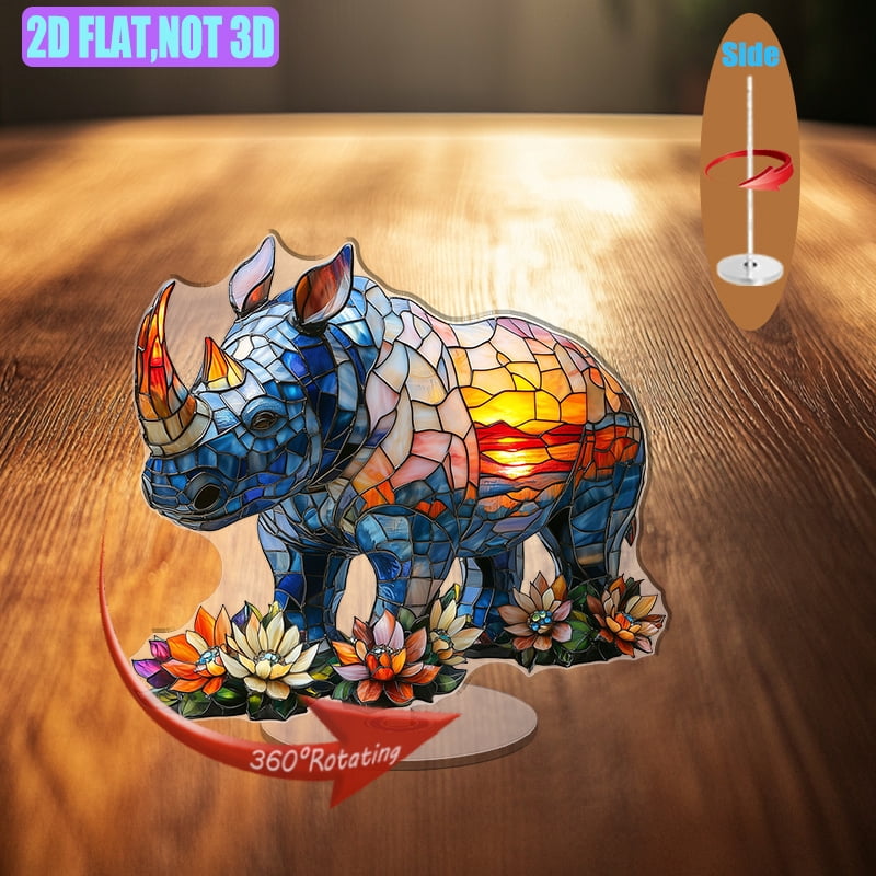Rotating acrylic display featuring a blue and pink gradient rhino with vibrant stained glass ...