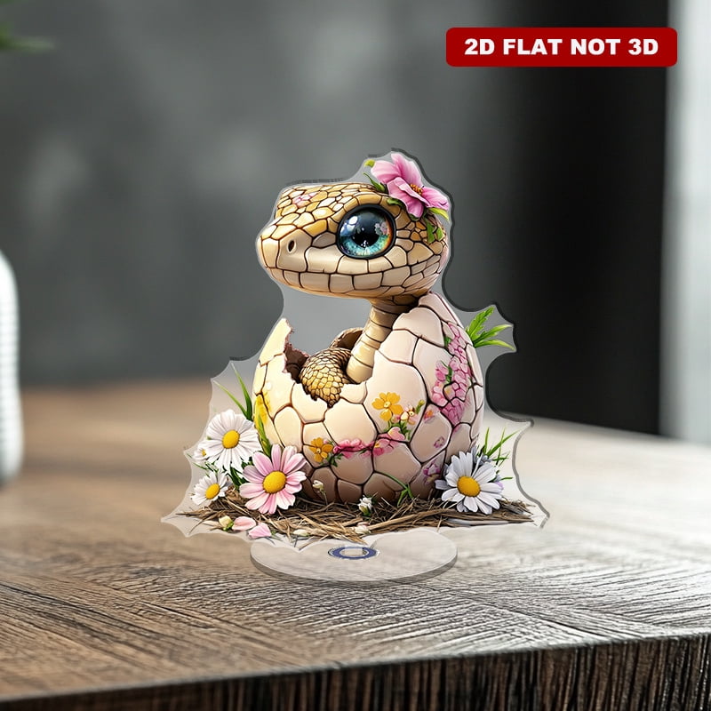 Rotating acrylic display featuring a charming snake hatching from a ...