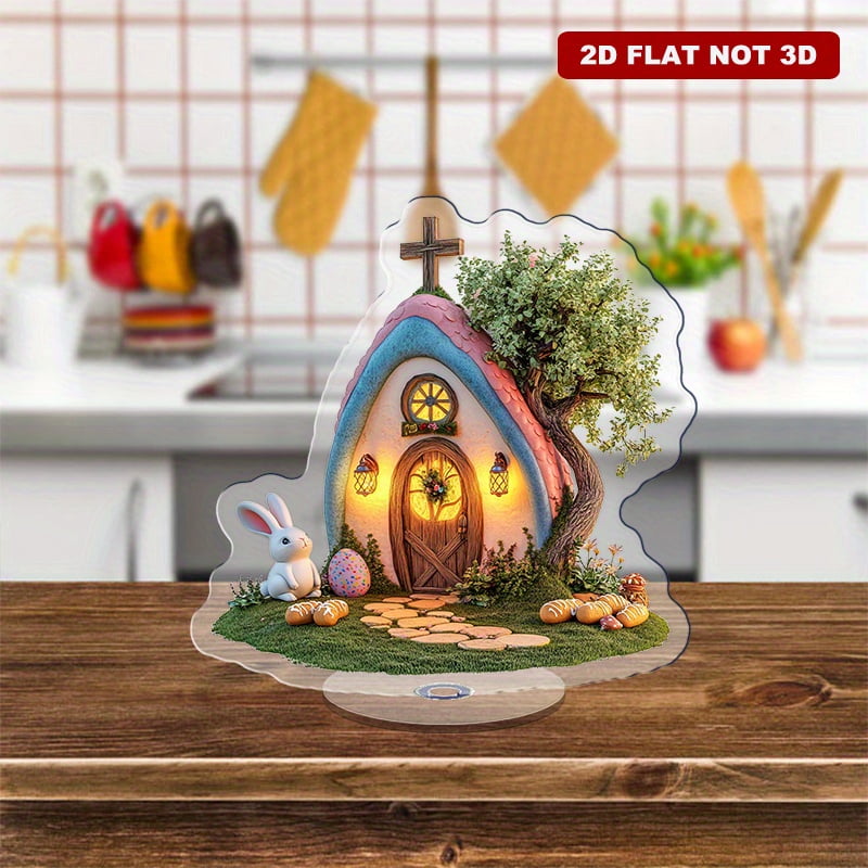 Rotating acrylic display featuring a colorful Easter egg hut with a ...