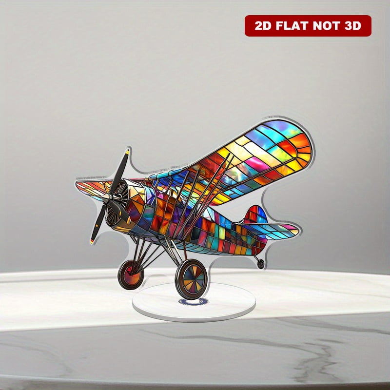 Rotating acrylic display featuring a colorful biplane in vibrant detail ...
