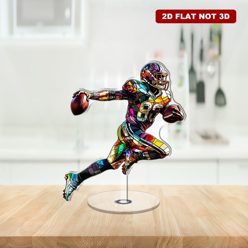 Rotating acrylic display featuring a cornerback leaping to intercept a ...
