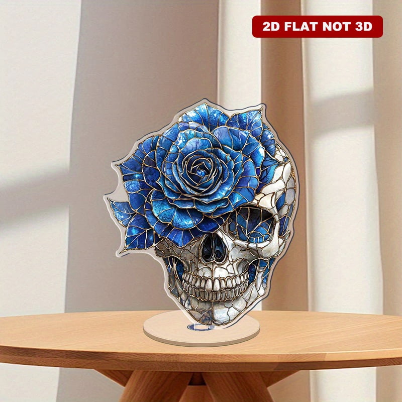 Rotating acrylic display featuring a detailed skull intertwined with a ...