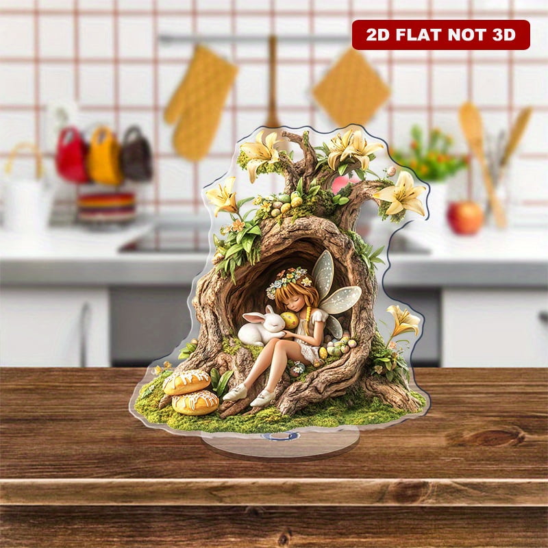 Rotating acrylic display featuring a fairy with a bunny in a tree hollow surrounded by Easter ...