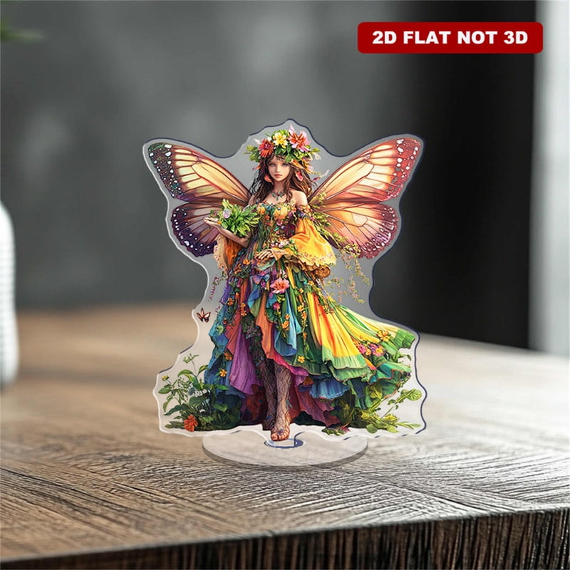 Rotating acrylic display featuring a fairy with butterfly wings in a colorful floral dress ...