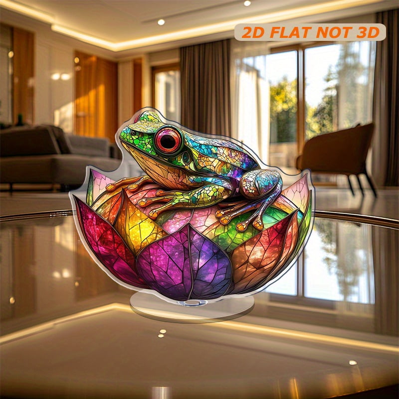 Rotating acrylic display featuring a frog on a lotus pod with ...