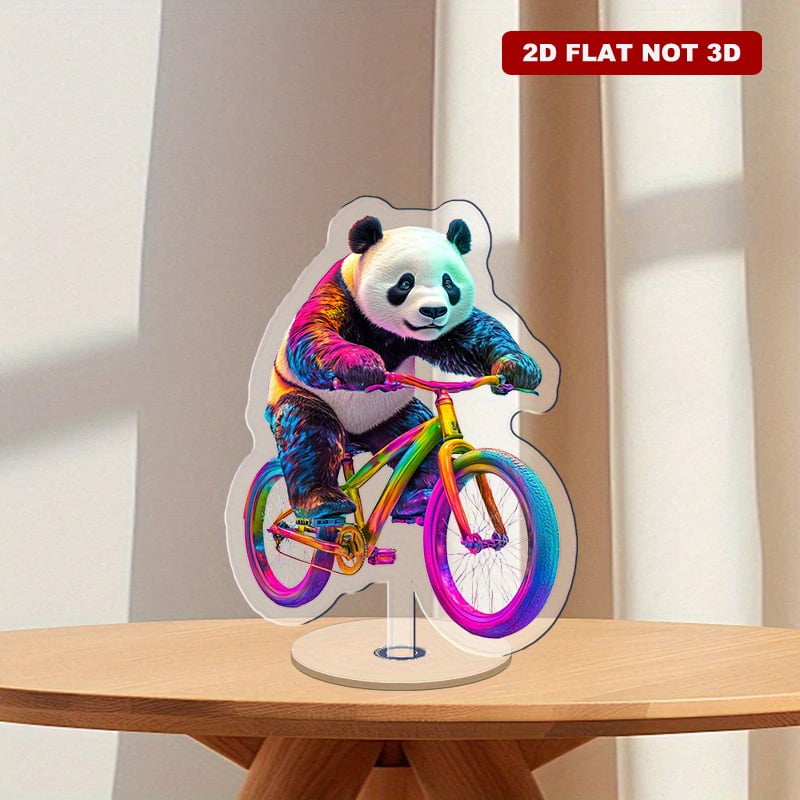 Rotating acrylic display featuring a giant panda on a bicycle, vibrant ...