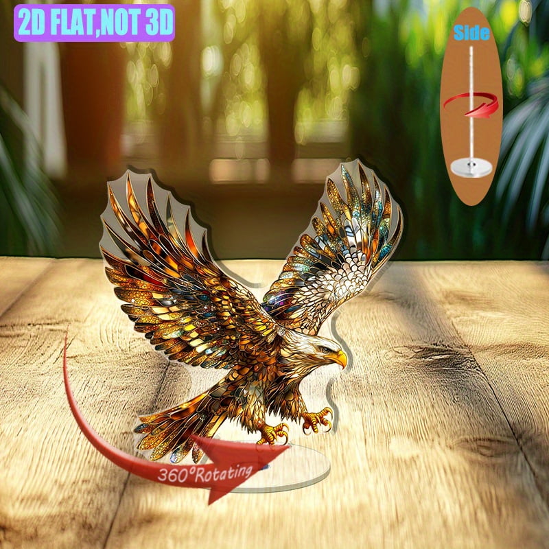Rotating acrylic display featuring a golden eagle with spread wings ...