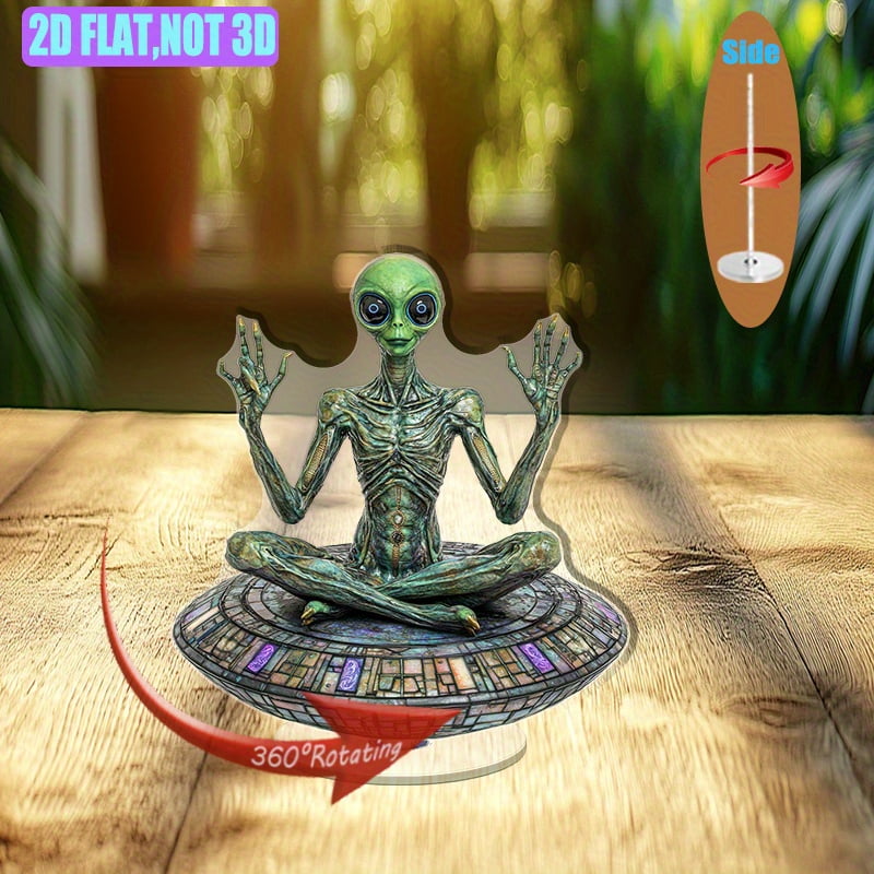 Rotating acrylic display featuring a green extraterrestrial in lotus ...
