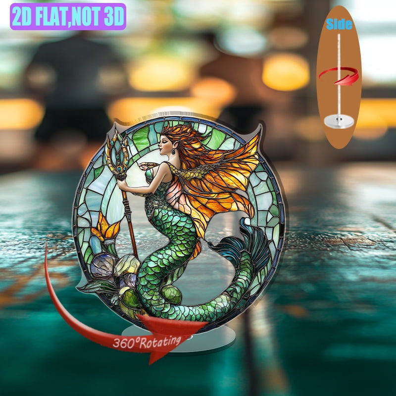 Rotating acrylic display featuring a green sea serpent and mermaid ...