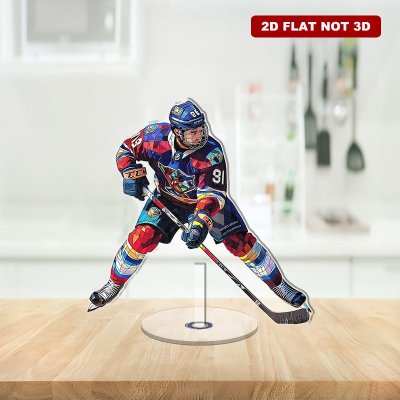Rotating acrylic display featuring a hockey player shielding the puck ...